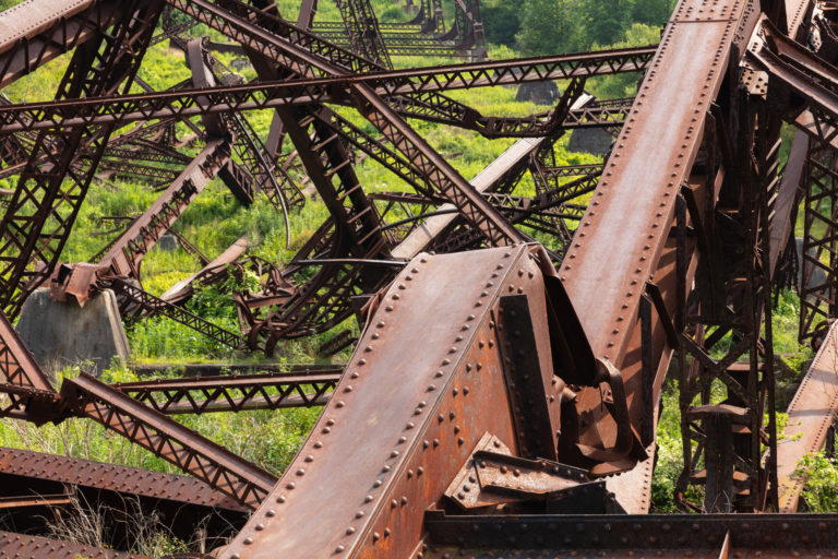 Destroyed Wrought Iron Trestle Bridge - Duncan.co